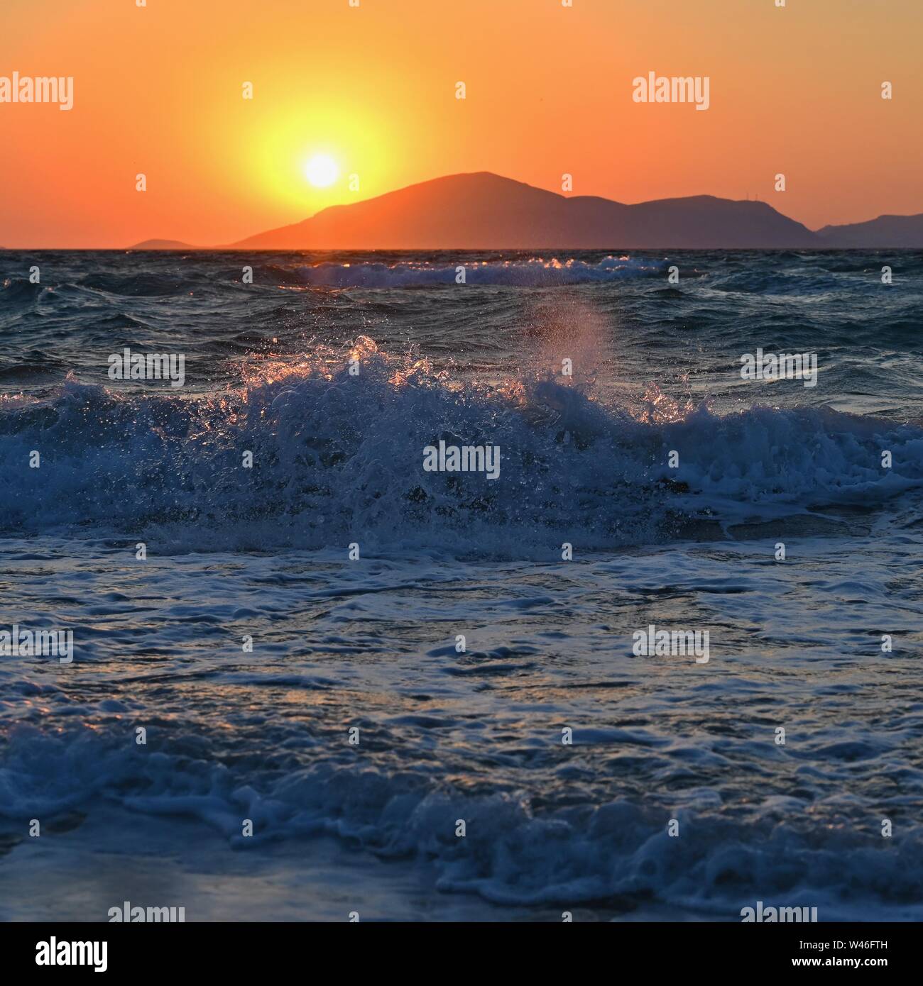 Beautiful sunset with sea and waves. Natural colorful background ...