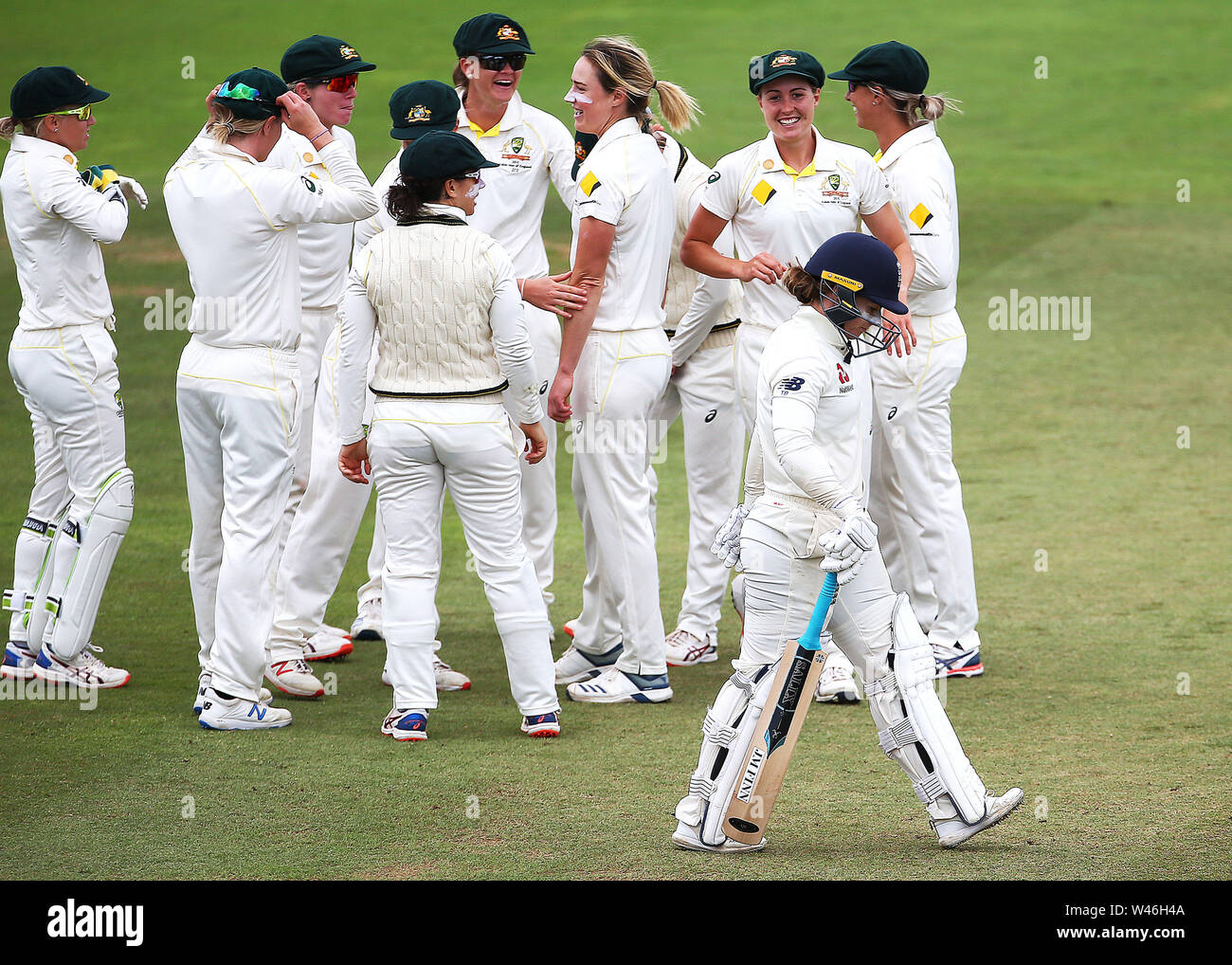 England's Tammy Beaumont looks to the ground in dejection after being ...