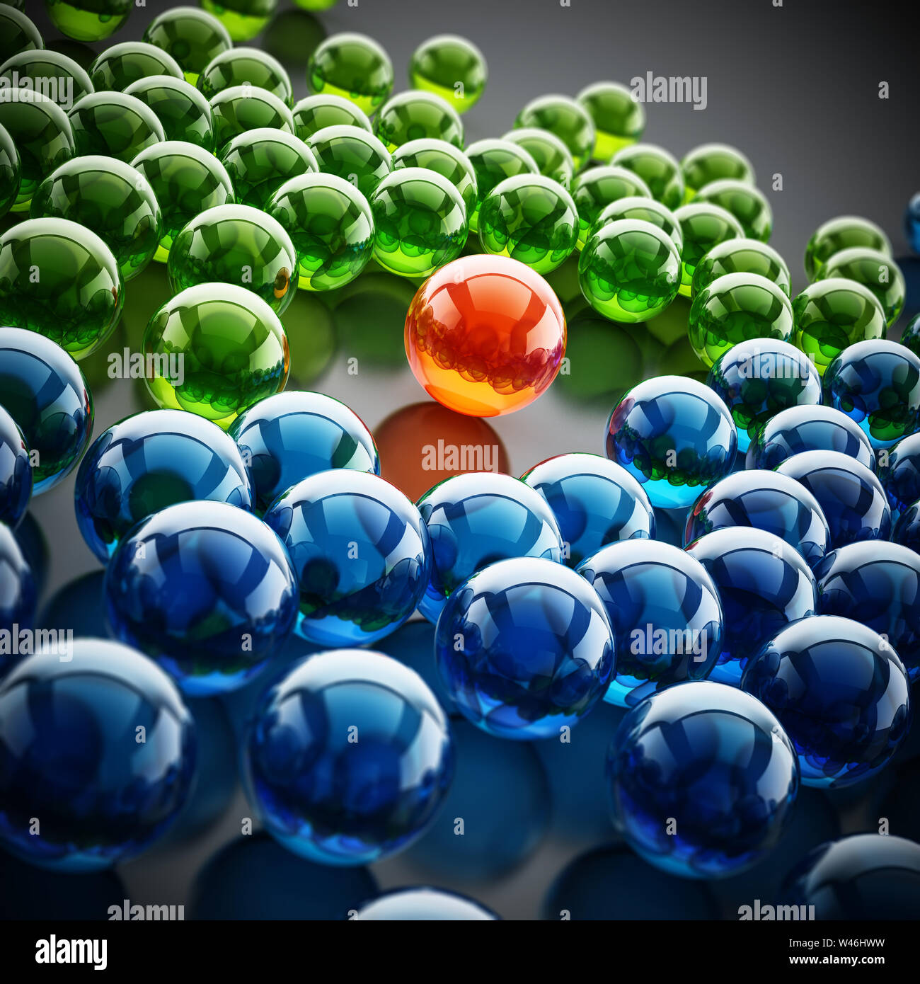 Red shiny sphere standing out among green and blue spheres. 3D ...