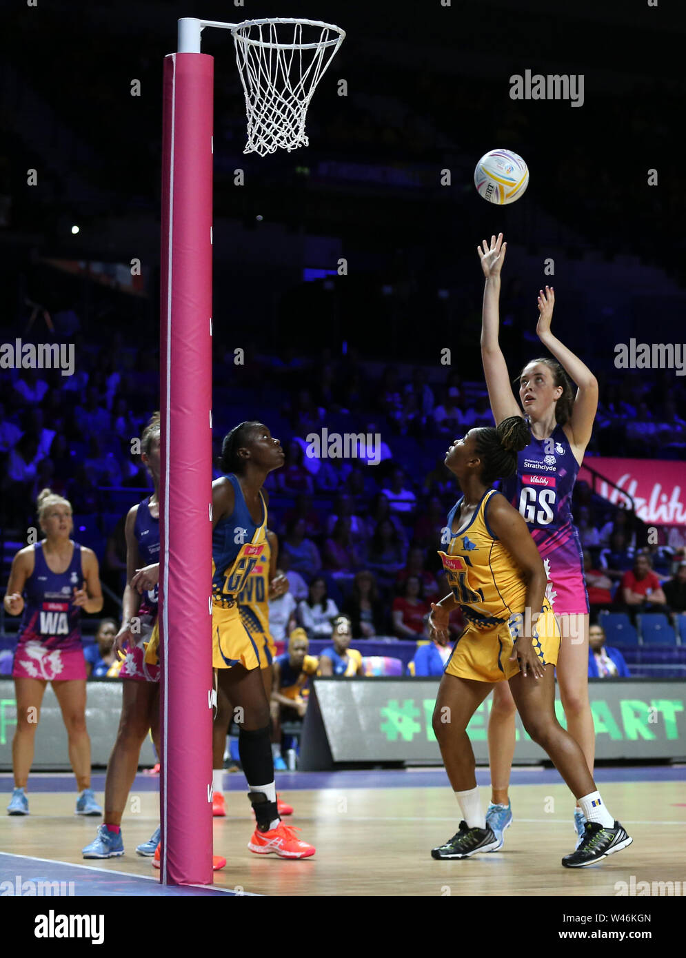 Scotland's Emma Barrie shoots against Barbados' during the Netball ...