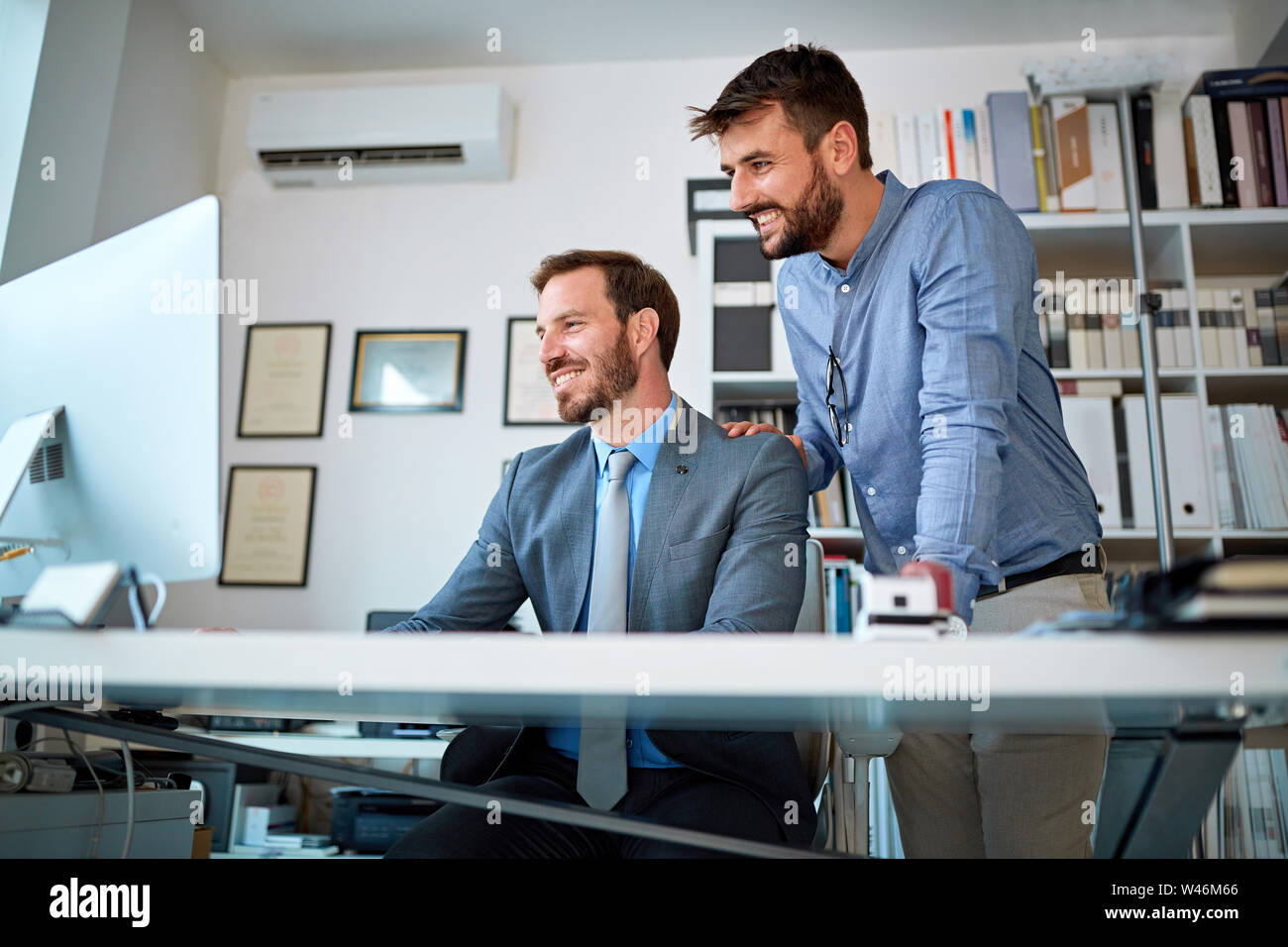 Teamwork, success concept - Happy businessman team Stock Photo - Alamy