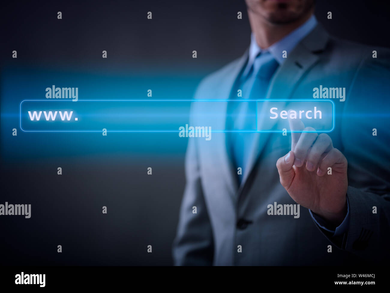 Businessman pushing virtual search bar Stock Photo - Alamy