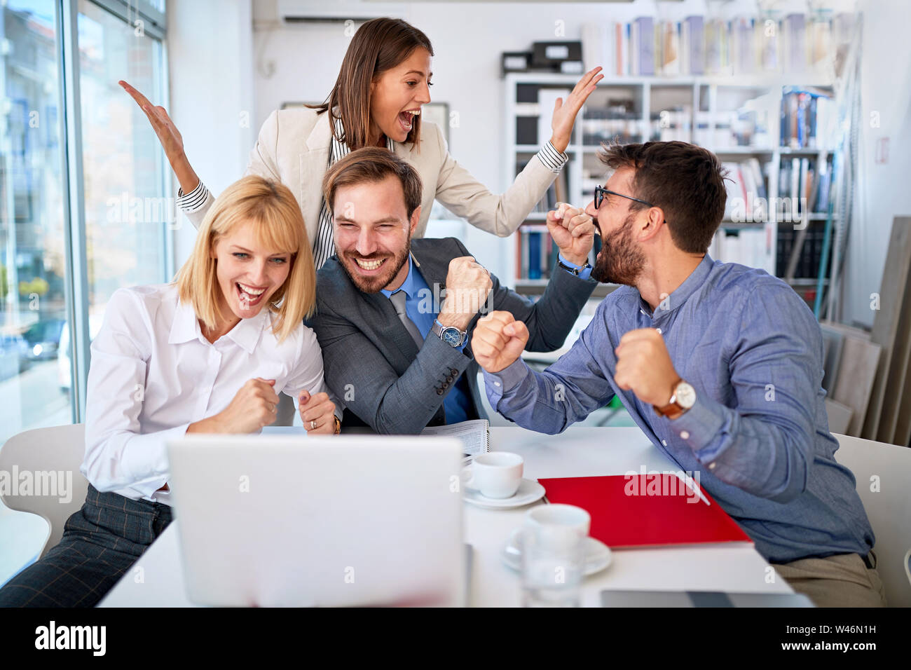 Happy business people successfully completed and contracted work Stock ...