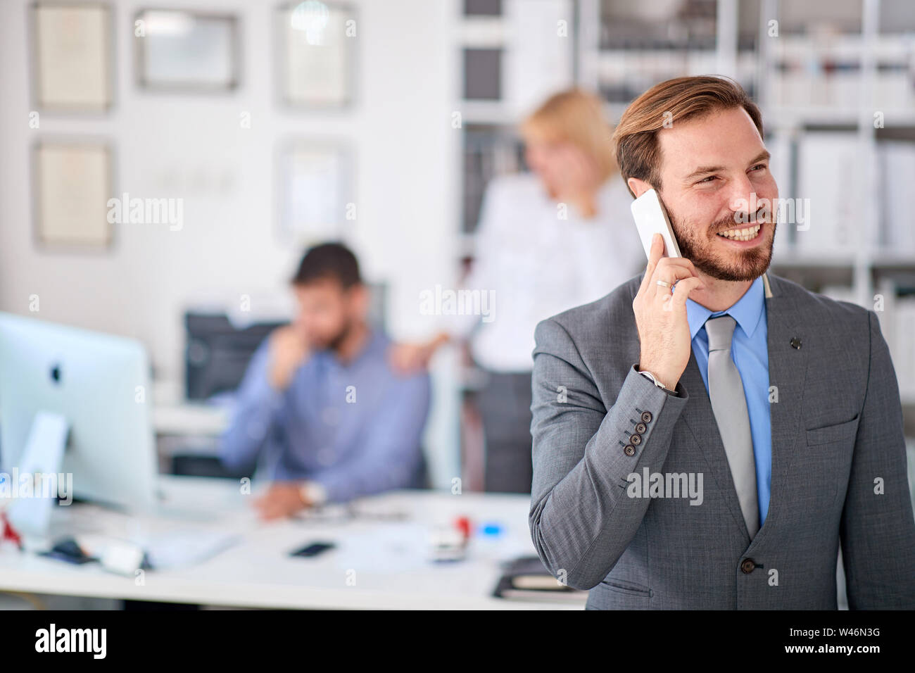 Portrait of successful man worker at office Stock Photo - Alamy
