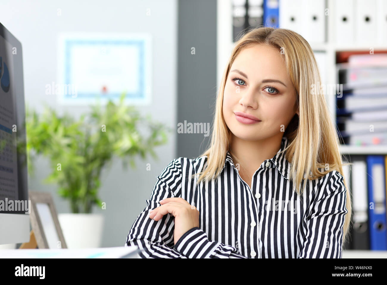 Smiling female accountant working hi-res stock photography and images - Alamy