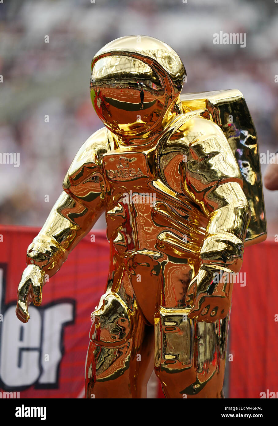 A statue of a golden astronaut to commemorate the Moon landings during ...