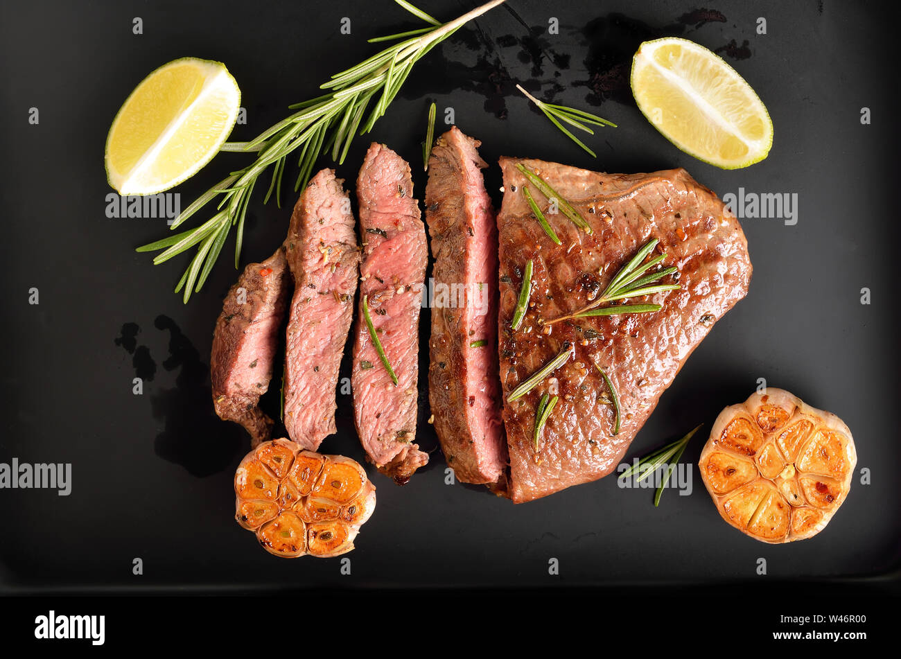 Steak medium rare beef with spices over dark background, top view Stock ...