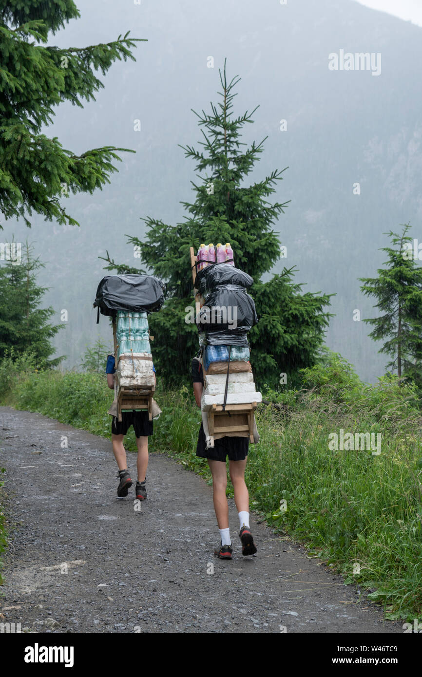 Young mountain porters in Slovak Tatra Mountains Stock Photo - Alamy