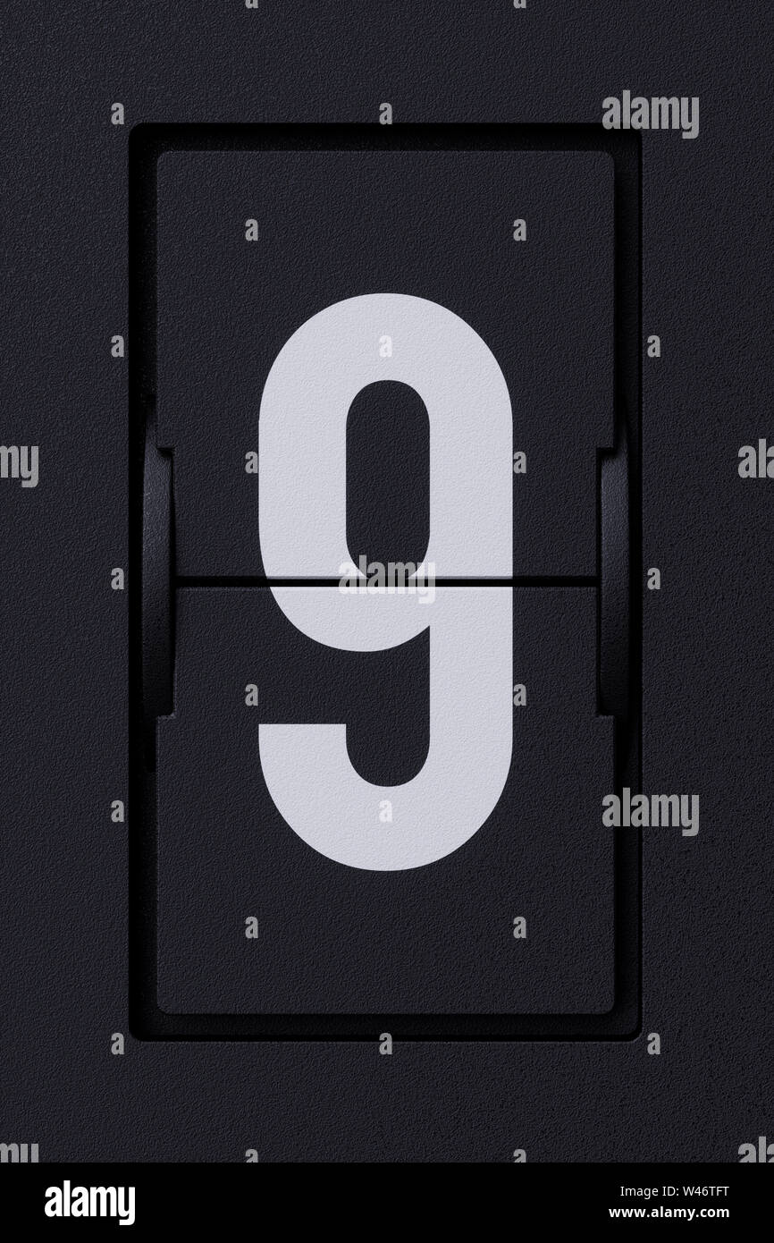 Airport mechanical flip board panel digits font. Front view white ...