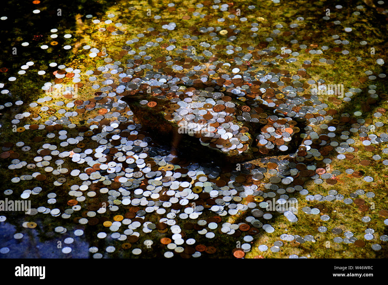 coins thrown into water Japan Stock Photo - Alamy