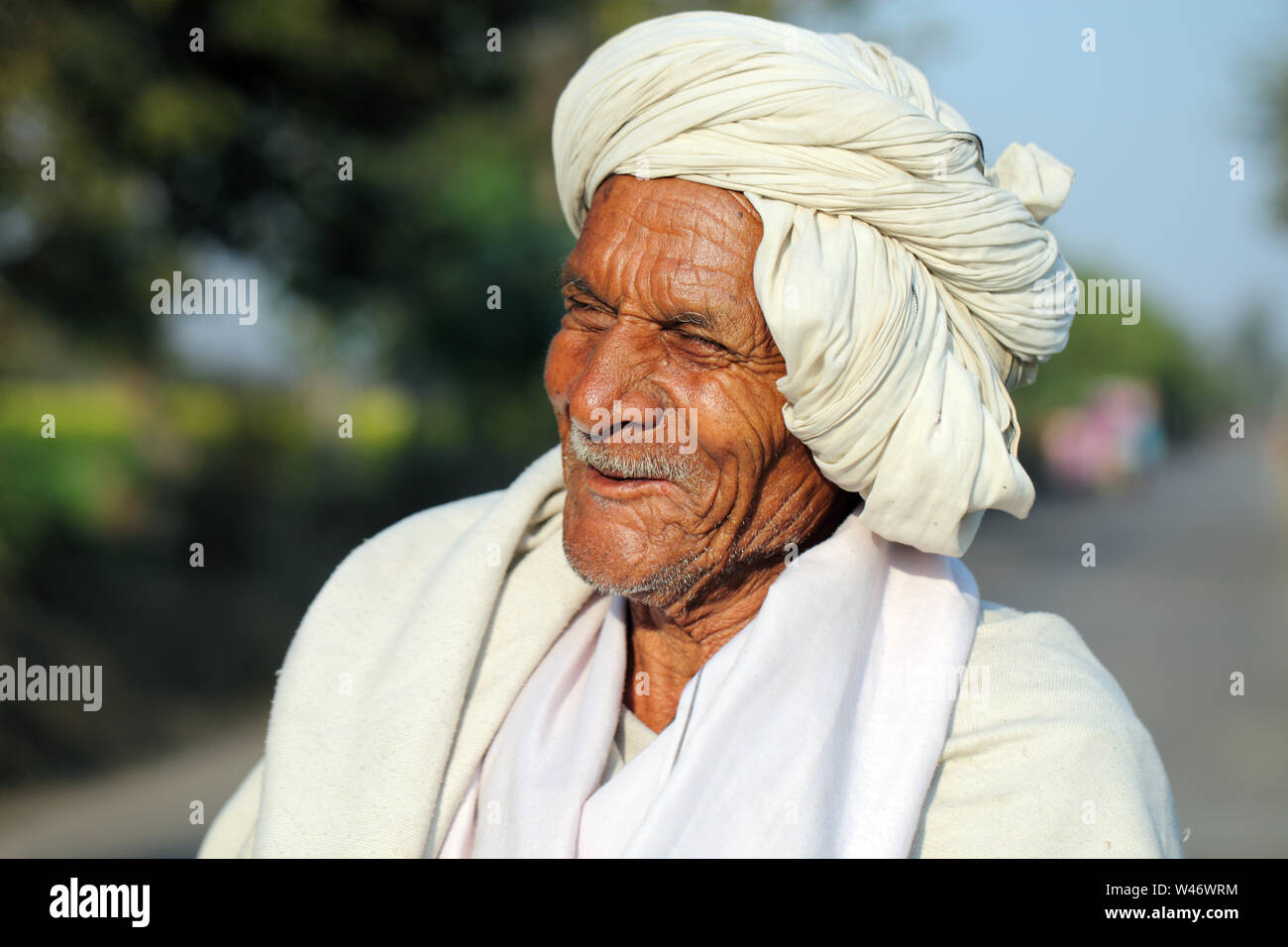 Senior man smiling Stock Photo - Alamy