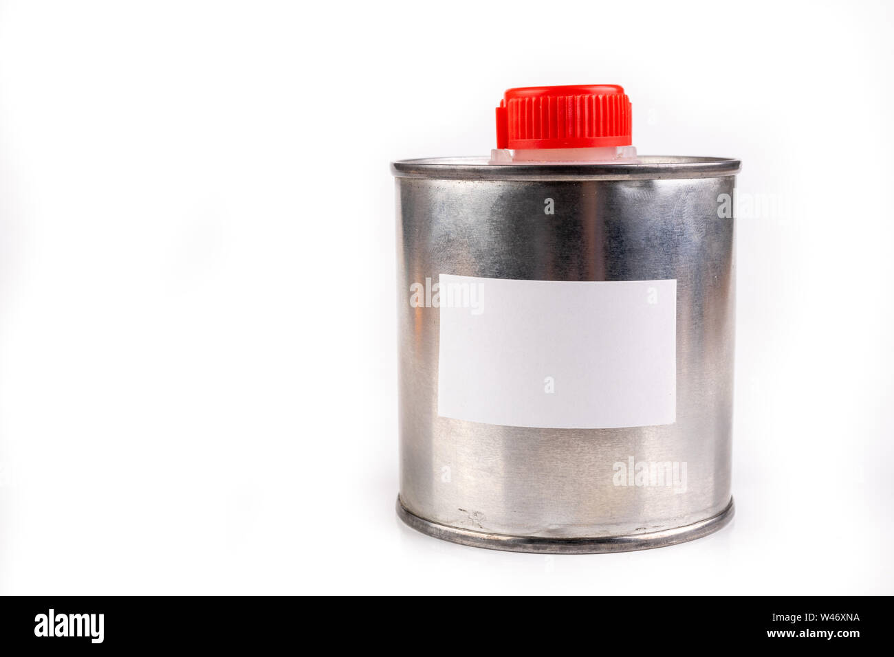 Metal container for chemicals with a white blank sticker. A tin plate ...