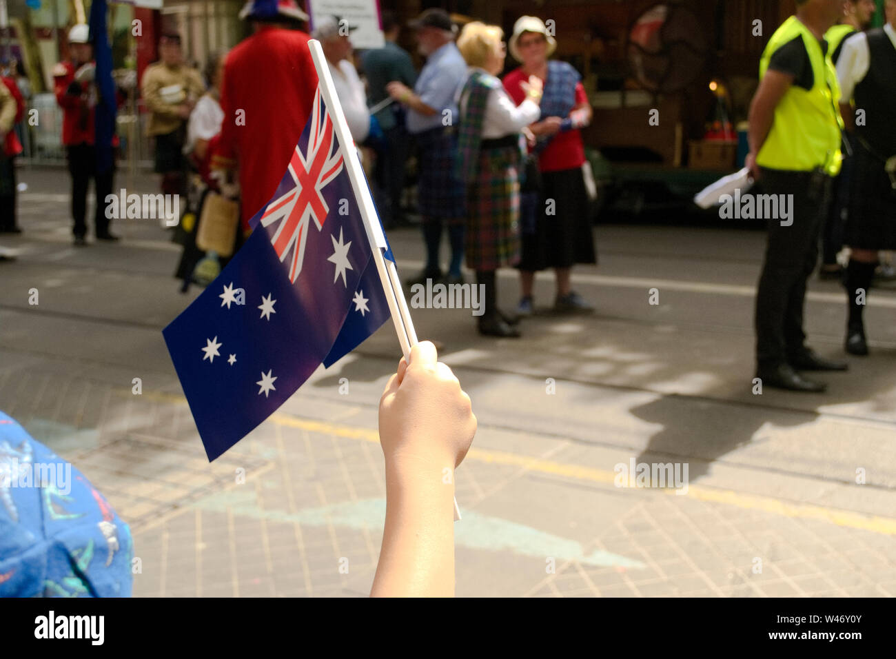 Australia Day in Melbourne - January 26, 2019. Child waving Australian ...
