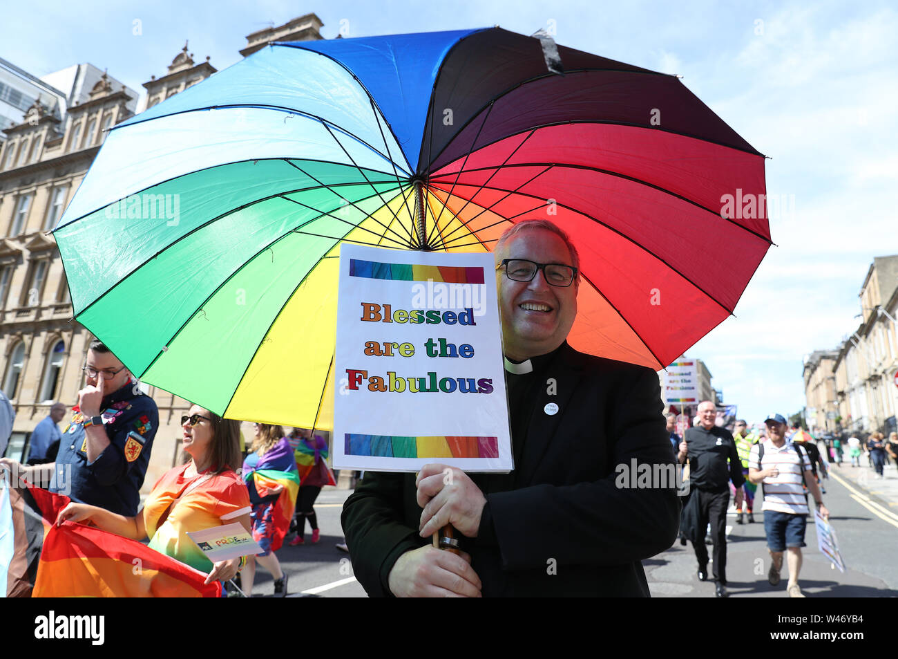 The LGBT community marching from Kelvingrove Park to George Square as ...