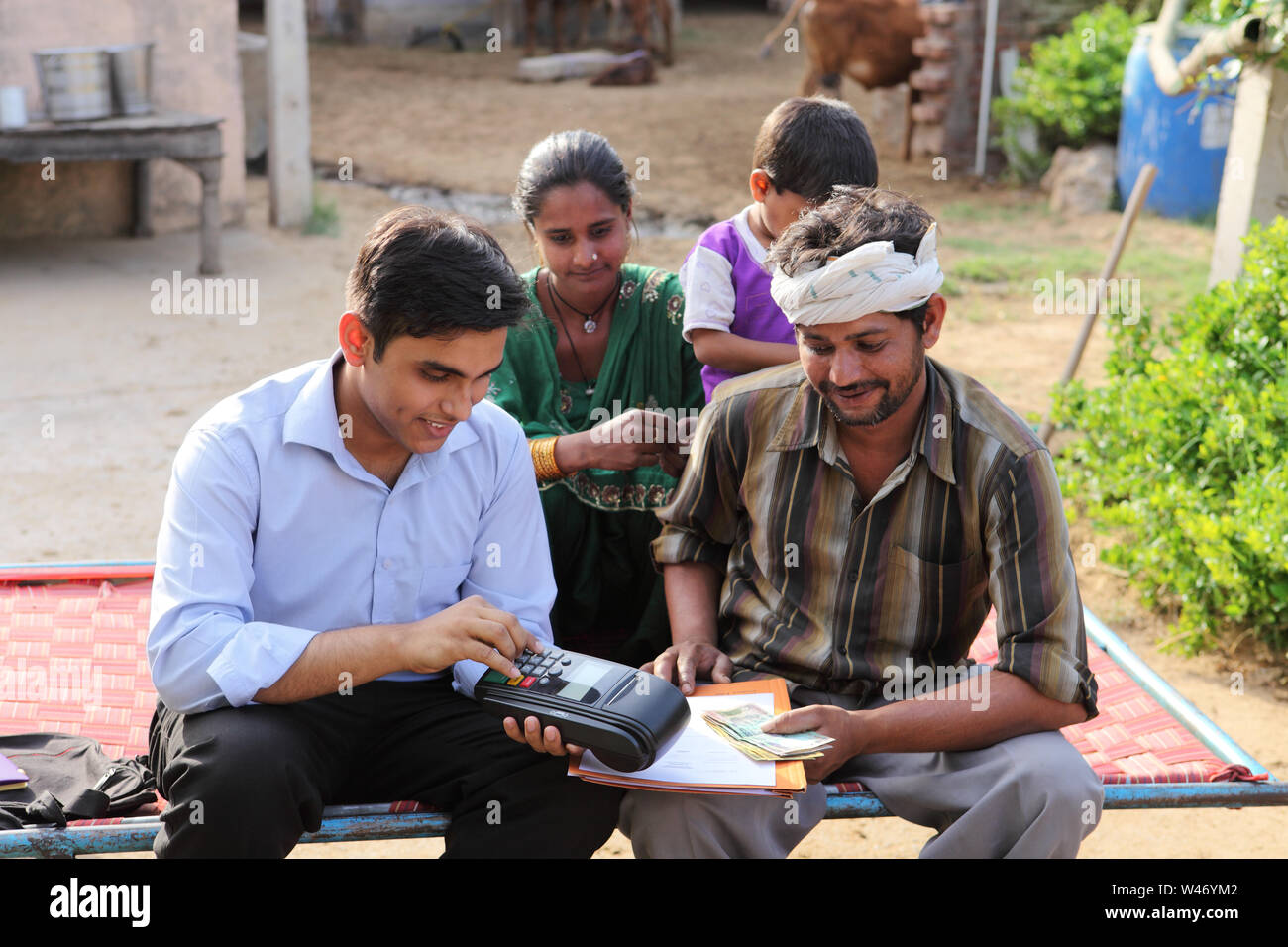 Executive banking with money transfer machine Stock Photo - Alamy