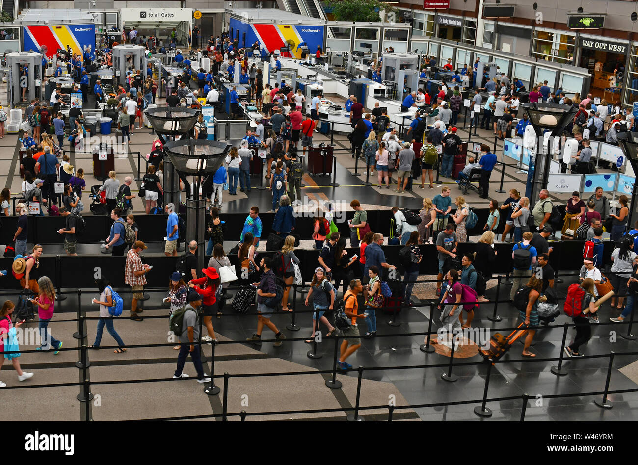 Crowds of travelers in long queue at Transportation Security ...