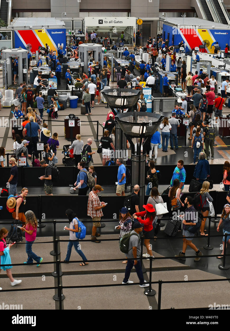 Crowds of travelers in long queue at Transportation Security ...