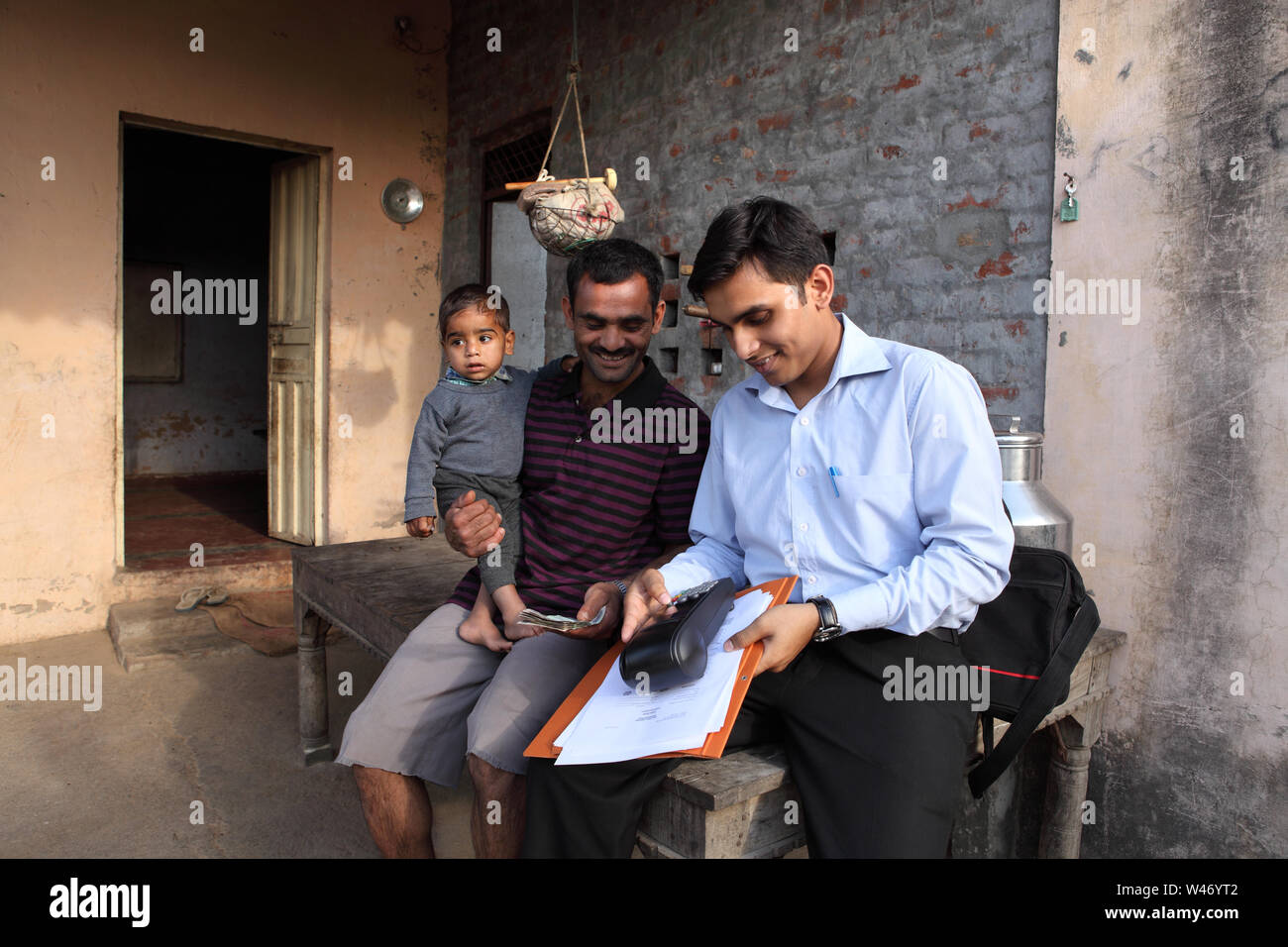 Executive banking with money transfer machine Stock Photo - Alamy