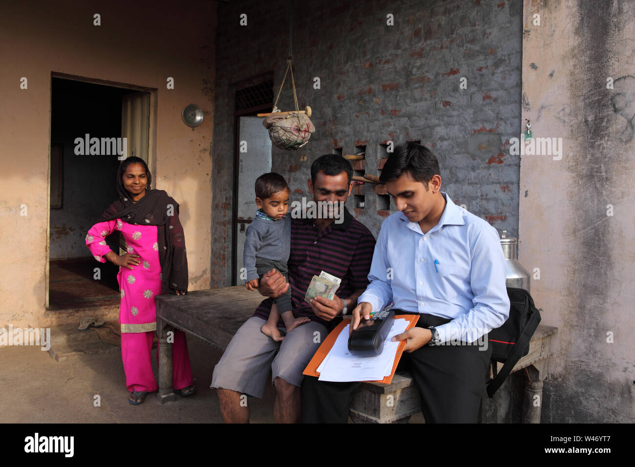 Transfer money village hi-res stock photography and images - Alamy