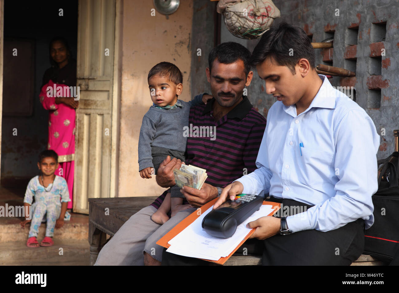 Executive banking with money transfer machine Stock Photo - Alamy