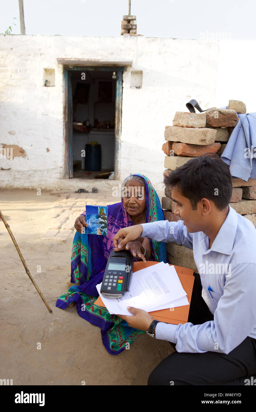 Indian rural villager woman money hi-res stock photography and images ...