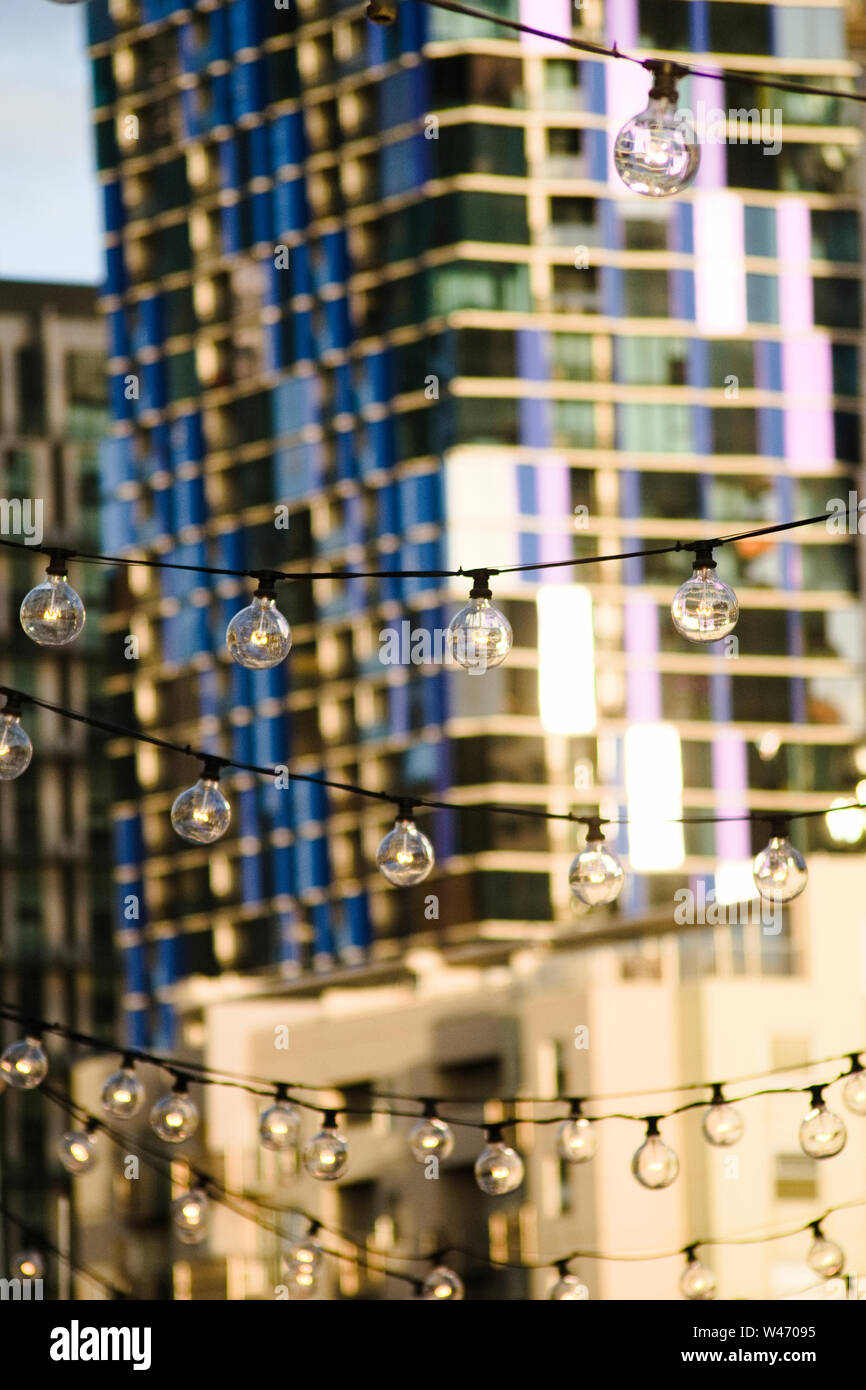 A hanging string of lights at Queen Victoria Night Market with the ...