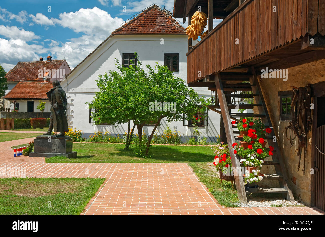 Josip Broz Tito's birthplace village; Tito statue beside his house ...