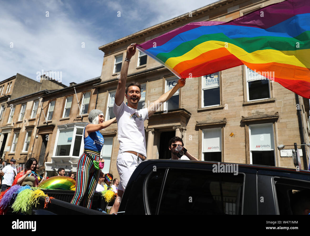 The LGBT community marching from Kelvingrove Park to George Square as ...
