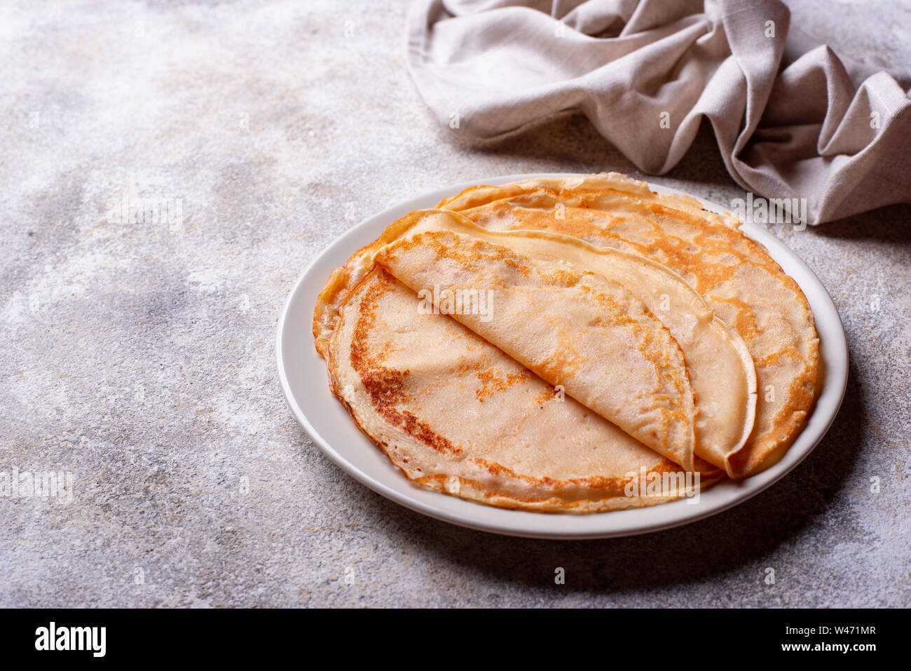 Pancakes crepes on light background Stock Photo - Alamy
