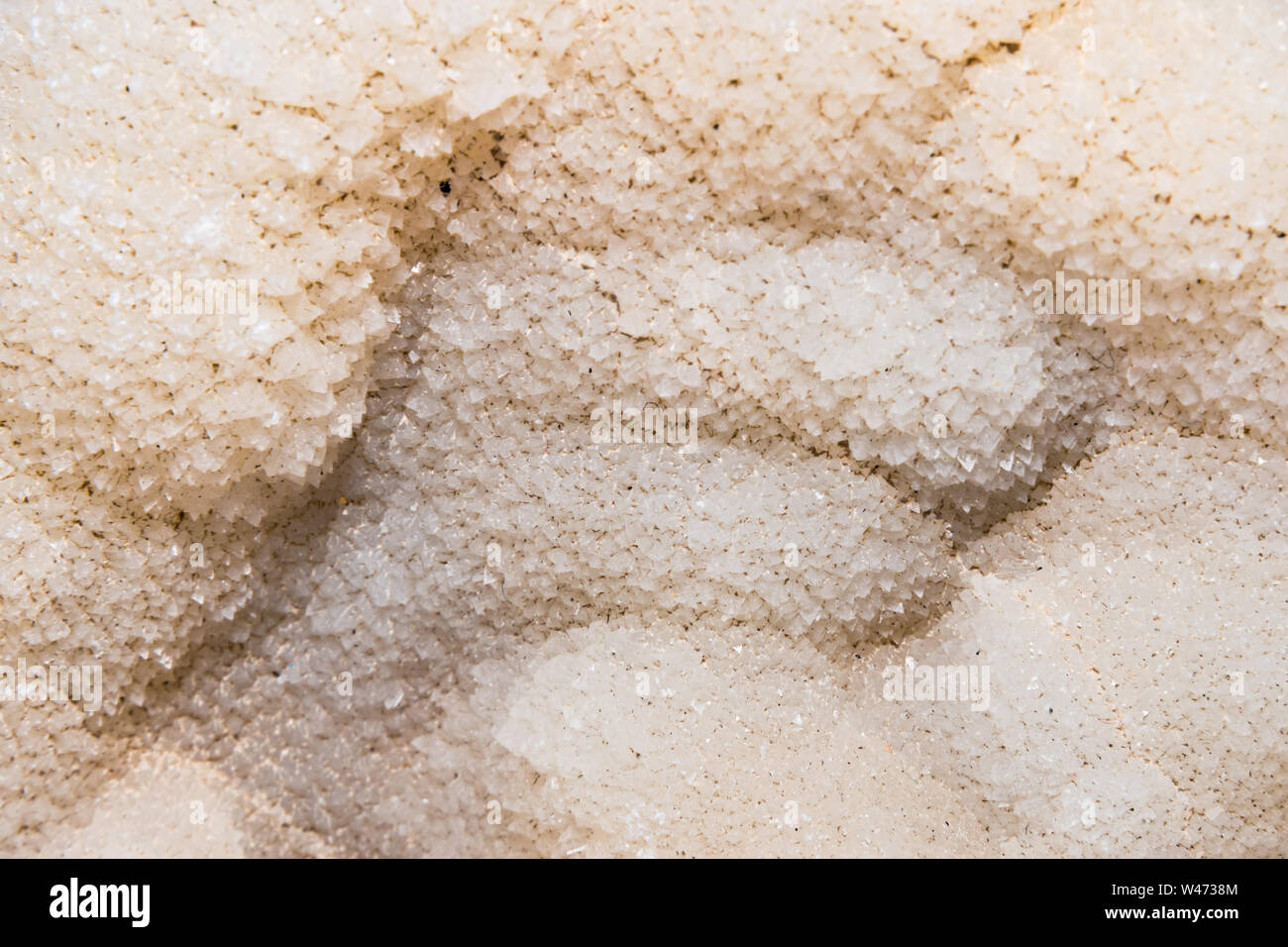 Calc-sinter white gemstone formed on an usual piece of bed rock Stock ...