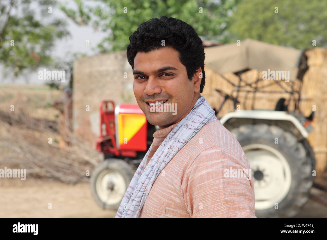 Portrait of an Indian farmer smiling Stock Photo - Alamy