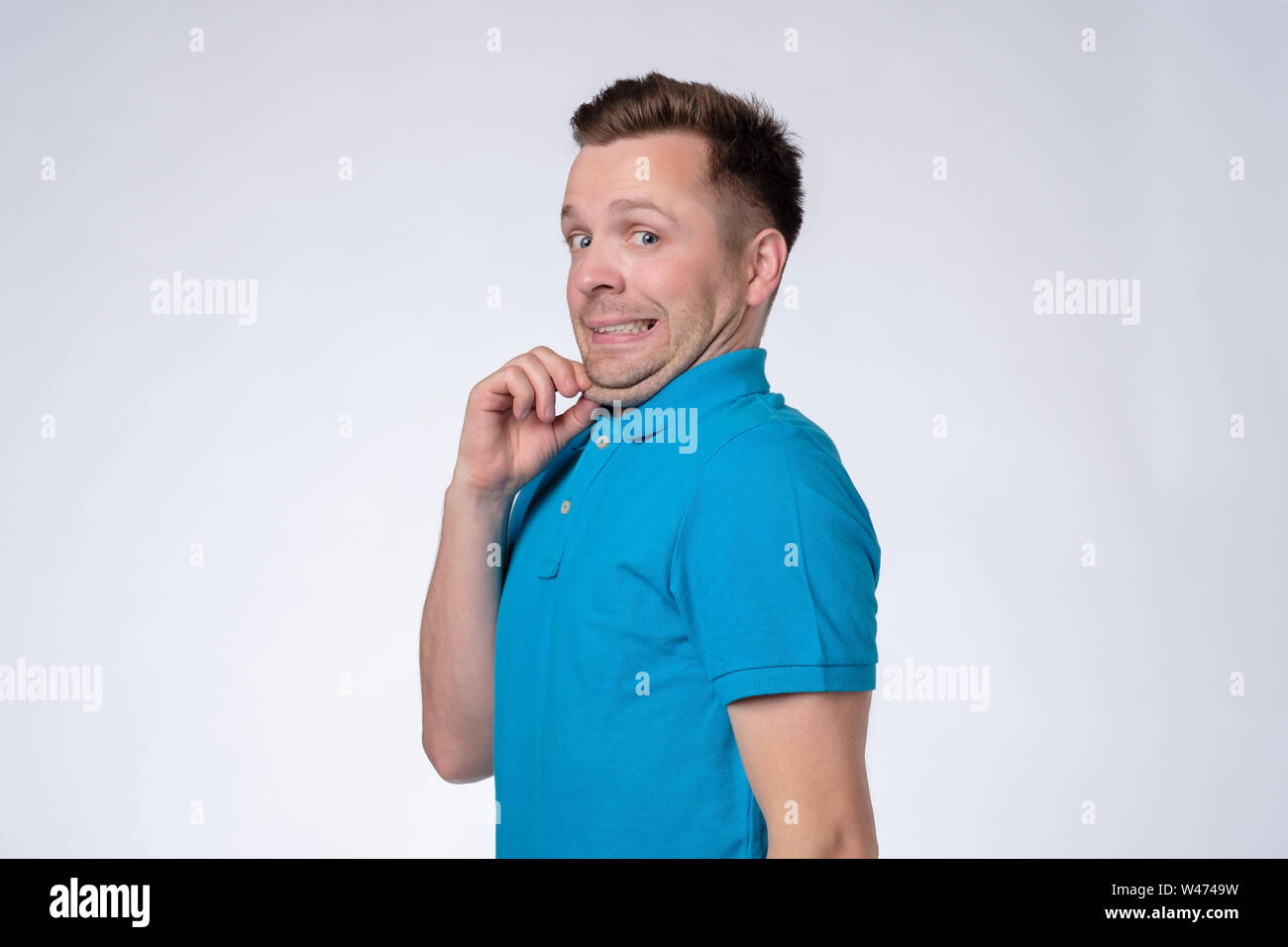 Fat man in a blue shirt hi-res stock photography and images - Alamy