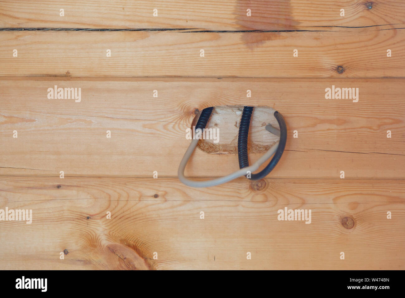 Hole in wooden wall for electrical switch or socket Stock Photo - Alamy