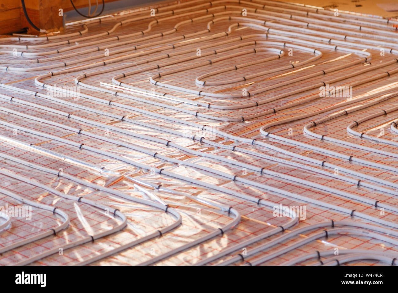 Underfloor surface heating pipes. Low temperature heating concept Stock ...