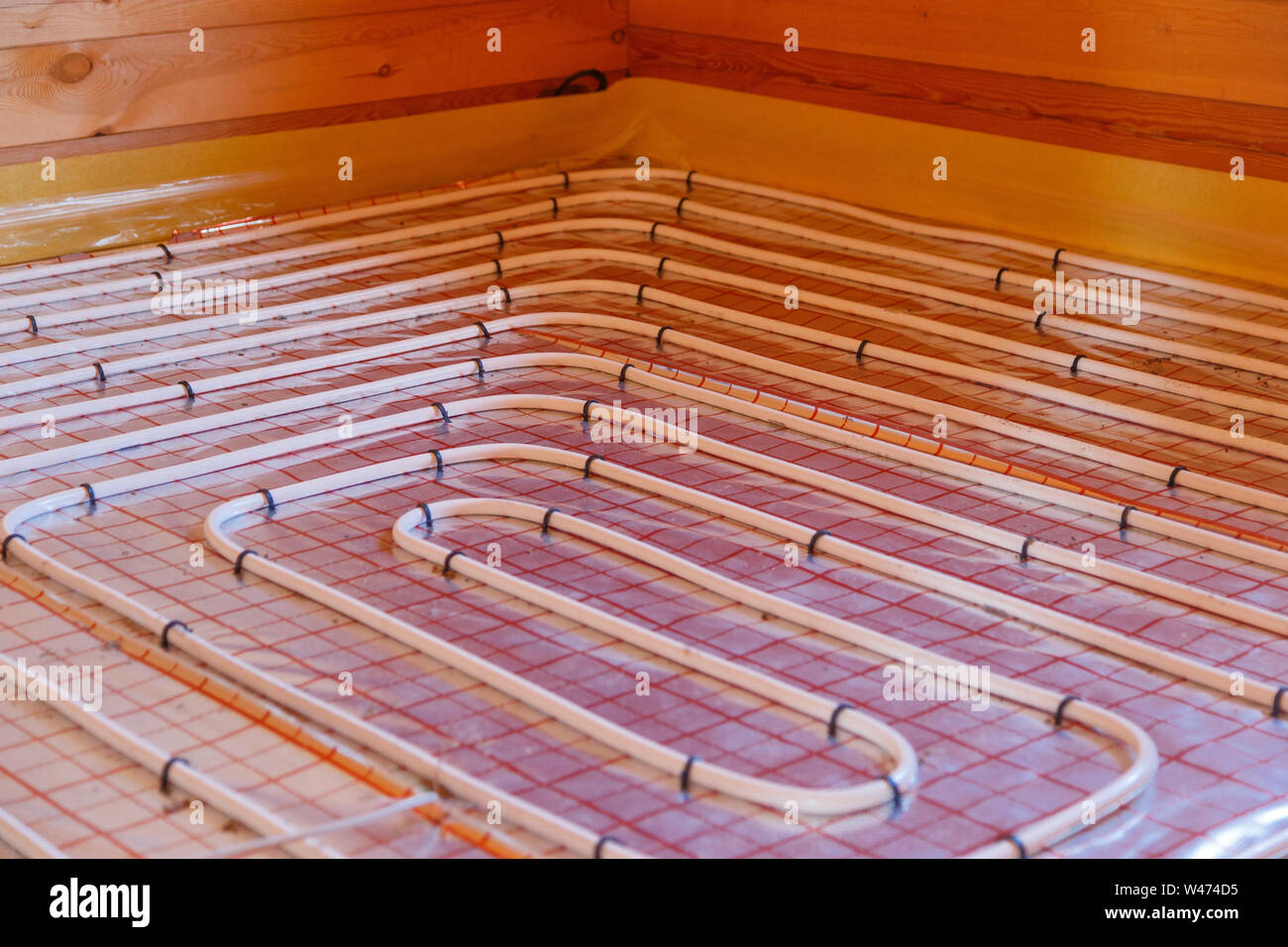 Underfloor surface heating pipes. Low temperature heating concept Stock ...