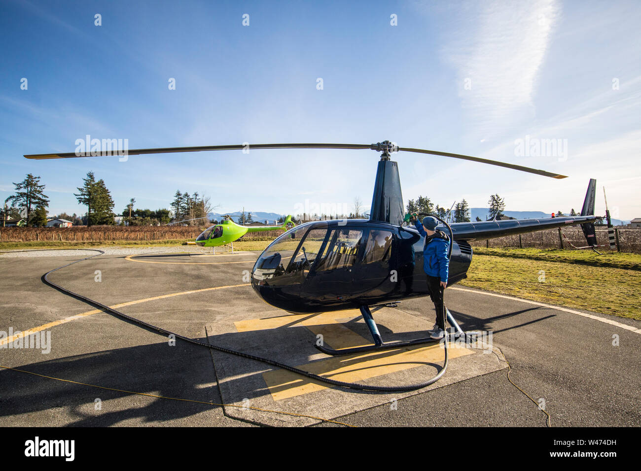 Two Person Helicopter High Resolution Stock Photography and Images - Alamy