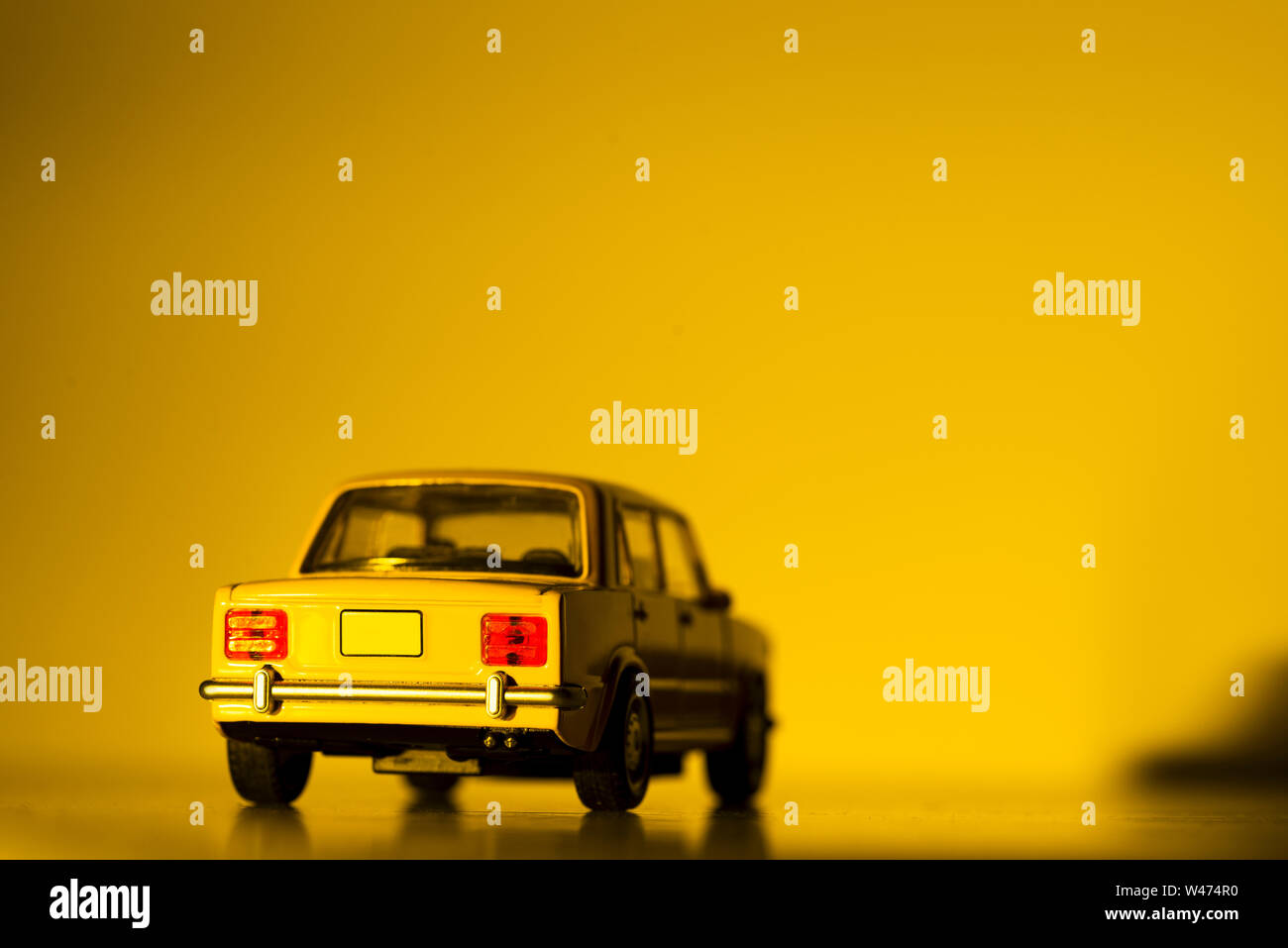 Izmir, Turkey - December 15, 2018: Rear view of a retro yellow toy car ...