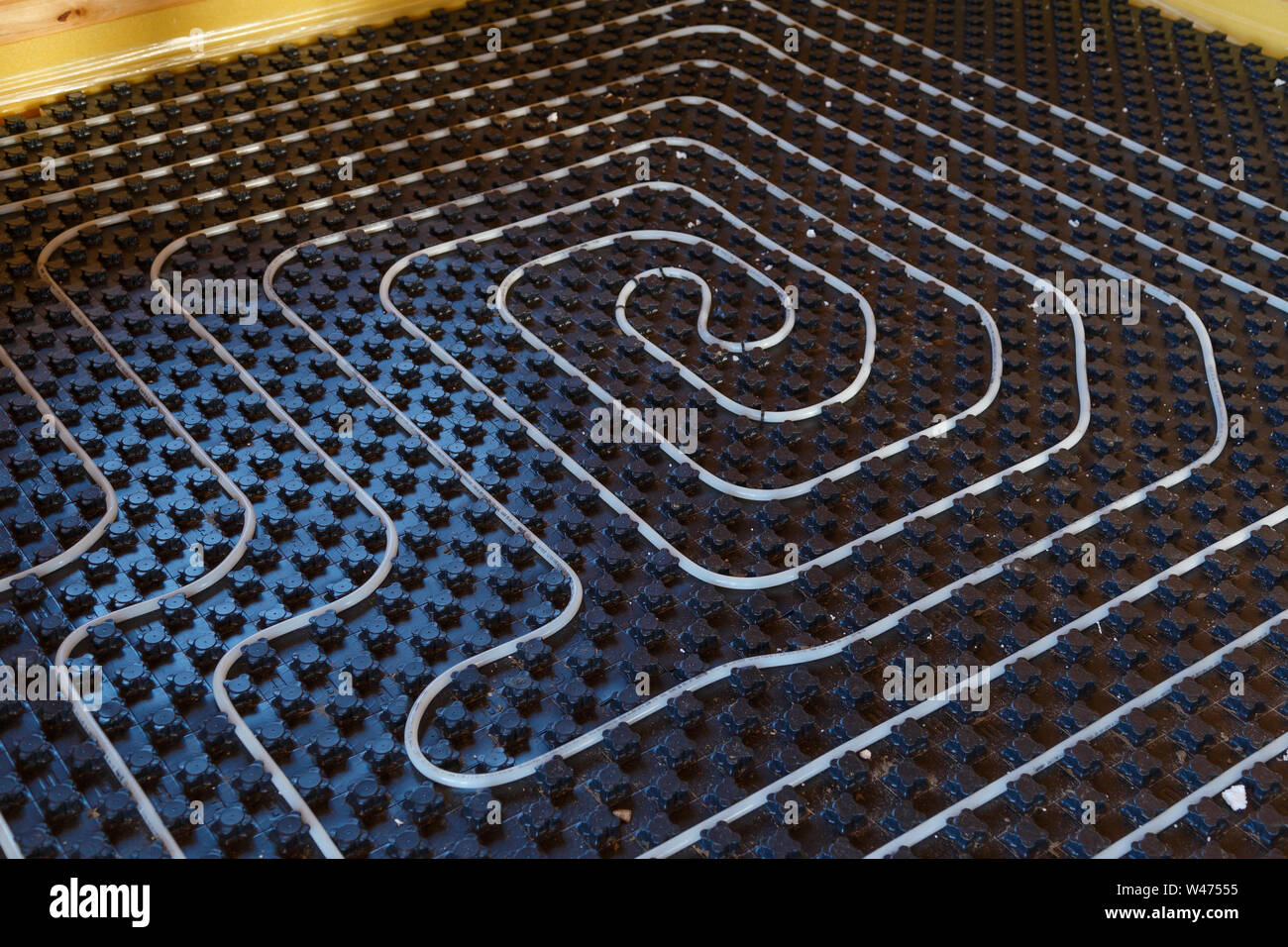 Underfloor heating pipes. Low temperature heating concept Stock Photo ...