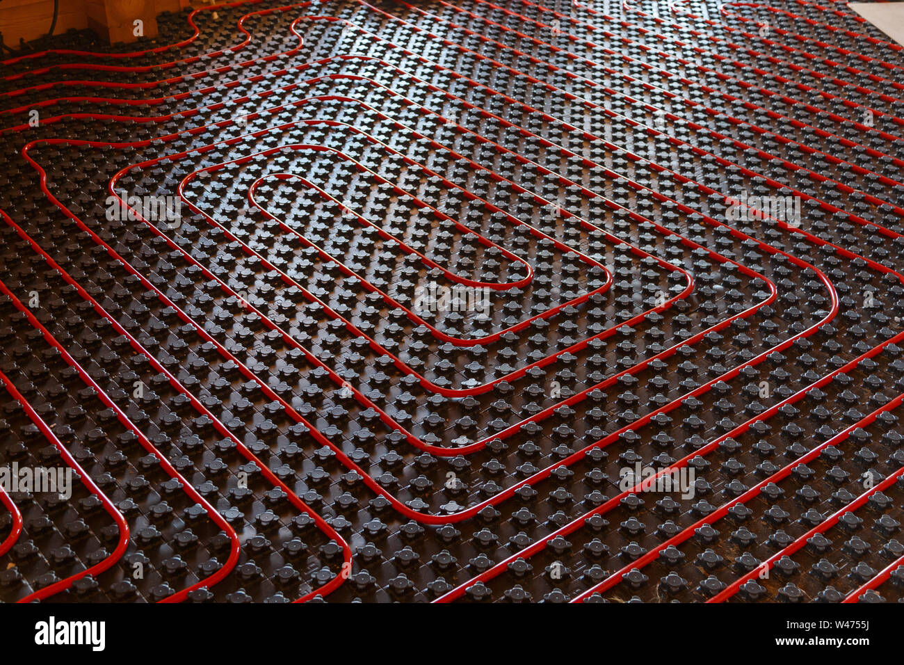 Underfloor heating pipes. Low temperature heating concept Stock Photo ...