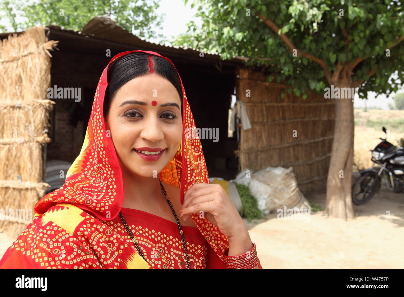 Portrait of a rural woman smiling Stock Photo - Alamy