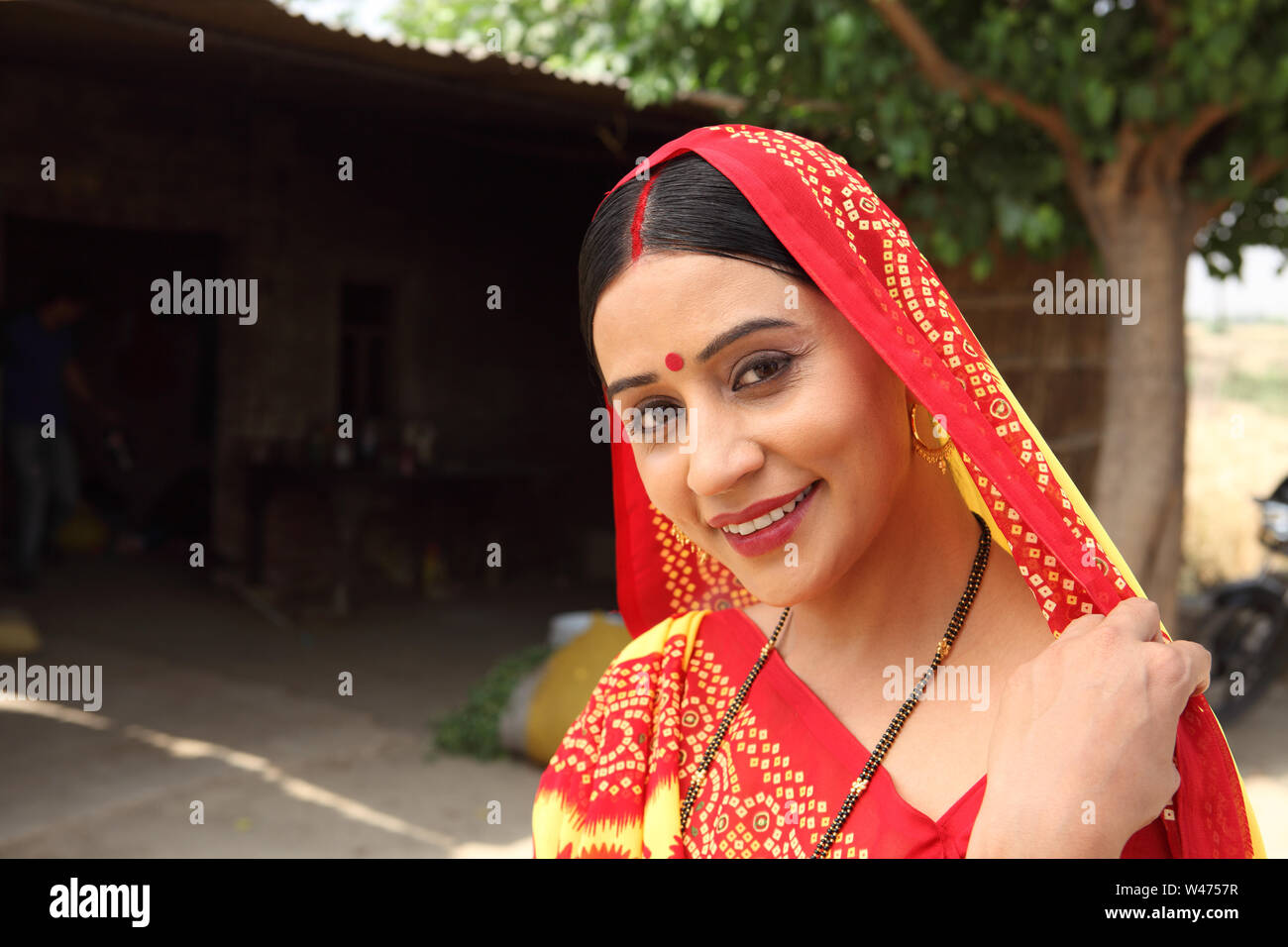 Portrait of a rural woman smiling Stock Photo - Alamy