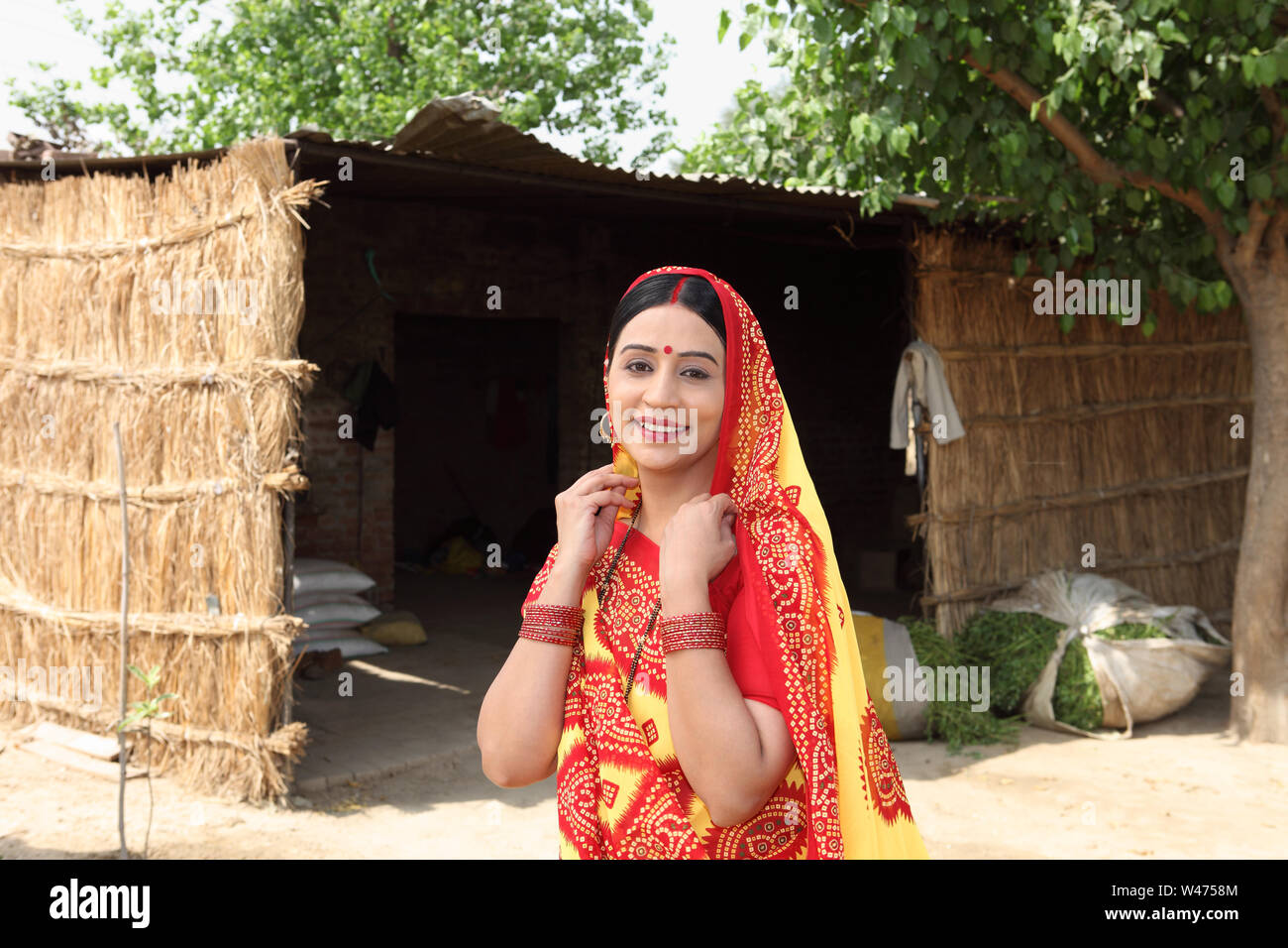 Portrait of a rural woman smiling Stock Photo - Alamy