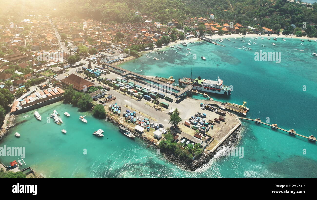 Aerial Flight above Ocean Harbor, Port, Pier in sunset soft light ...