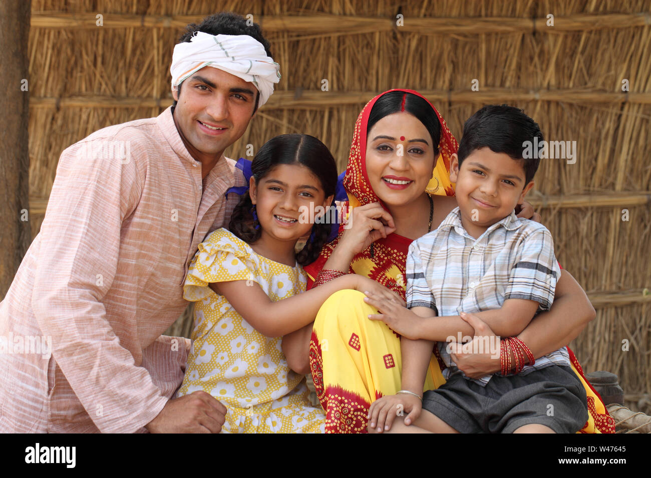 Portrait of rural family smiling Stock Photo - Alamy