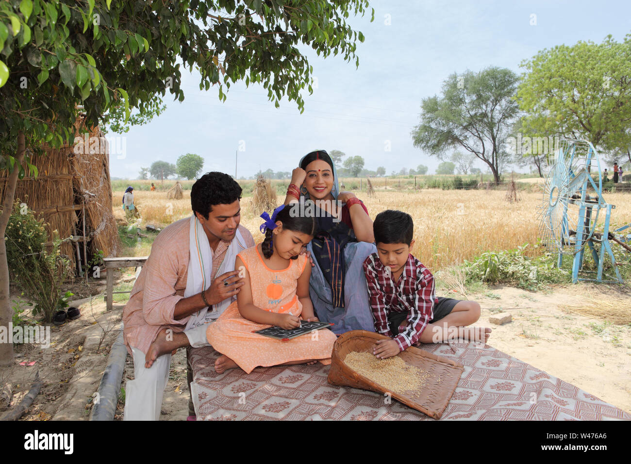 Indian rural woman reading book hi-res stock photography and images - Alamy