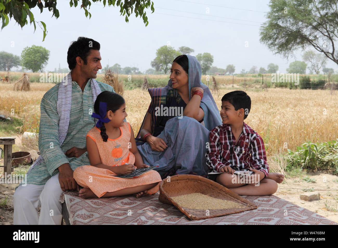 Indian Rural Woman Reading Book High Resolution Stock Photography and ...