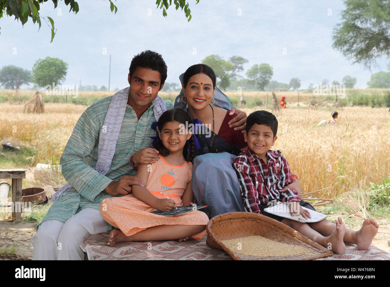 Rural indian woman teaching her son hi-res stock photography and images ...