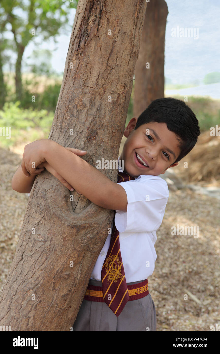 Children hugging the earth hi-res stock photography and images - Alamy