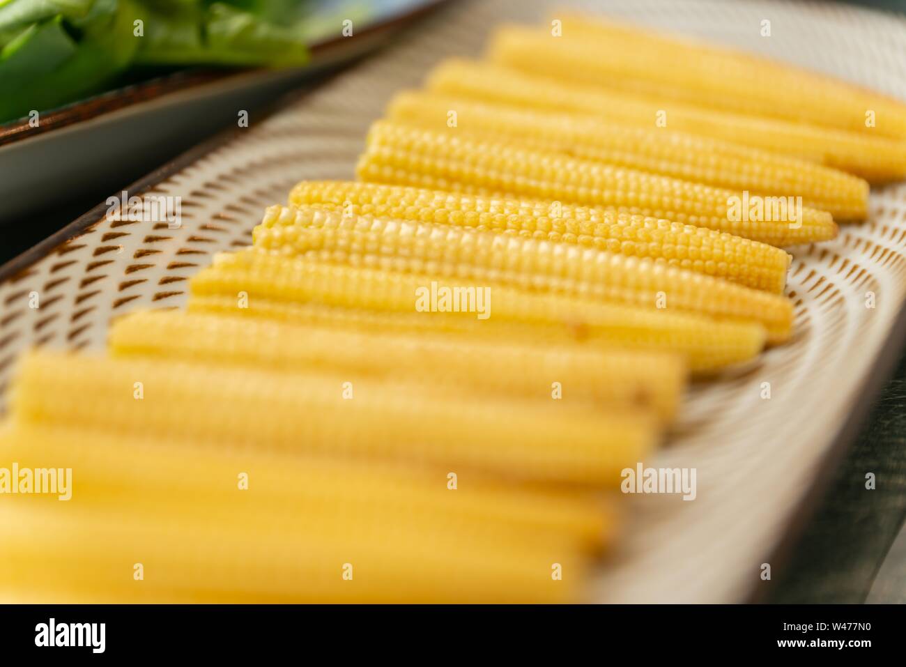 Closeup shot of baby corns on a trey Stock Photo - Alamy