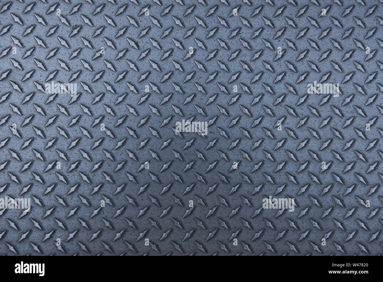 galvanized steel metal plate on the floor of the walkway of the ...